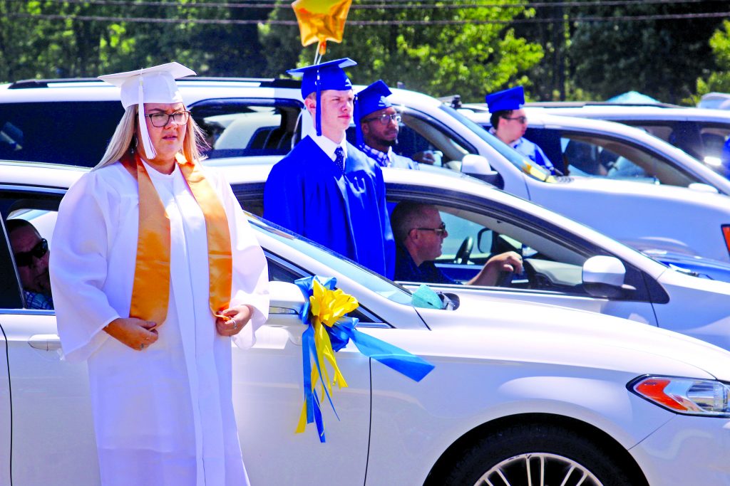 A graduation unlike any other: 93 drive up to get diplomas at MHS ...